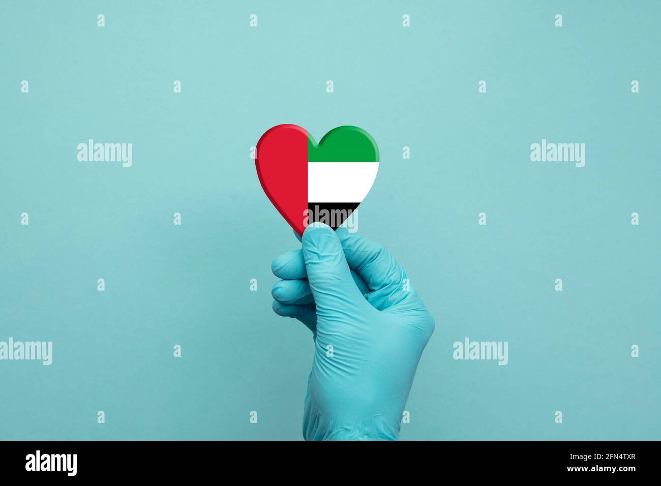 Uae flag hand hi-res stock photography and images - Alamy