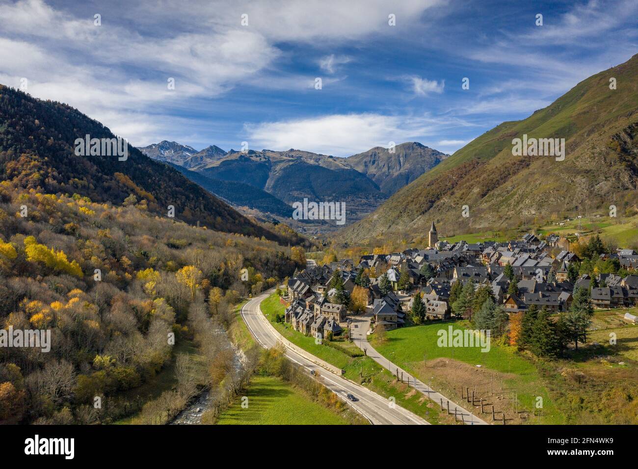 Aerial view of Garòs village and the surrounding forests in autumn ...