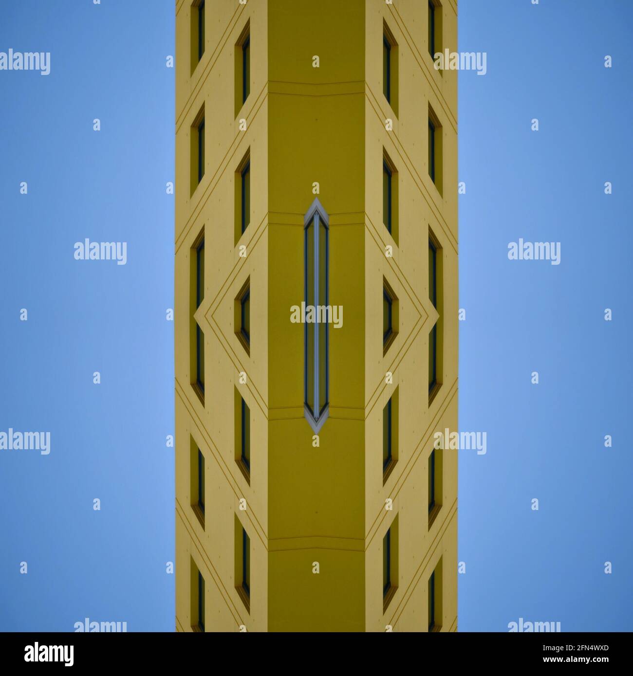 Illustration of a bright yellow vinyl cladding panel on a blue ...
