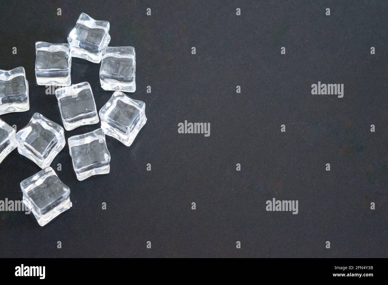 ice cube pieces not real on Grey background.artificial plastic clear ...