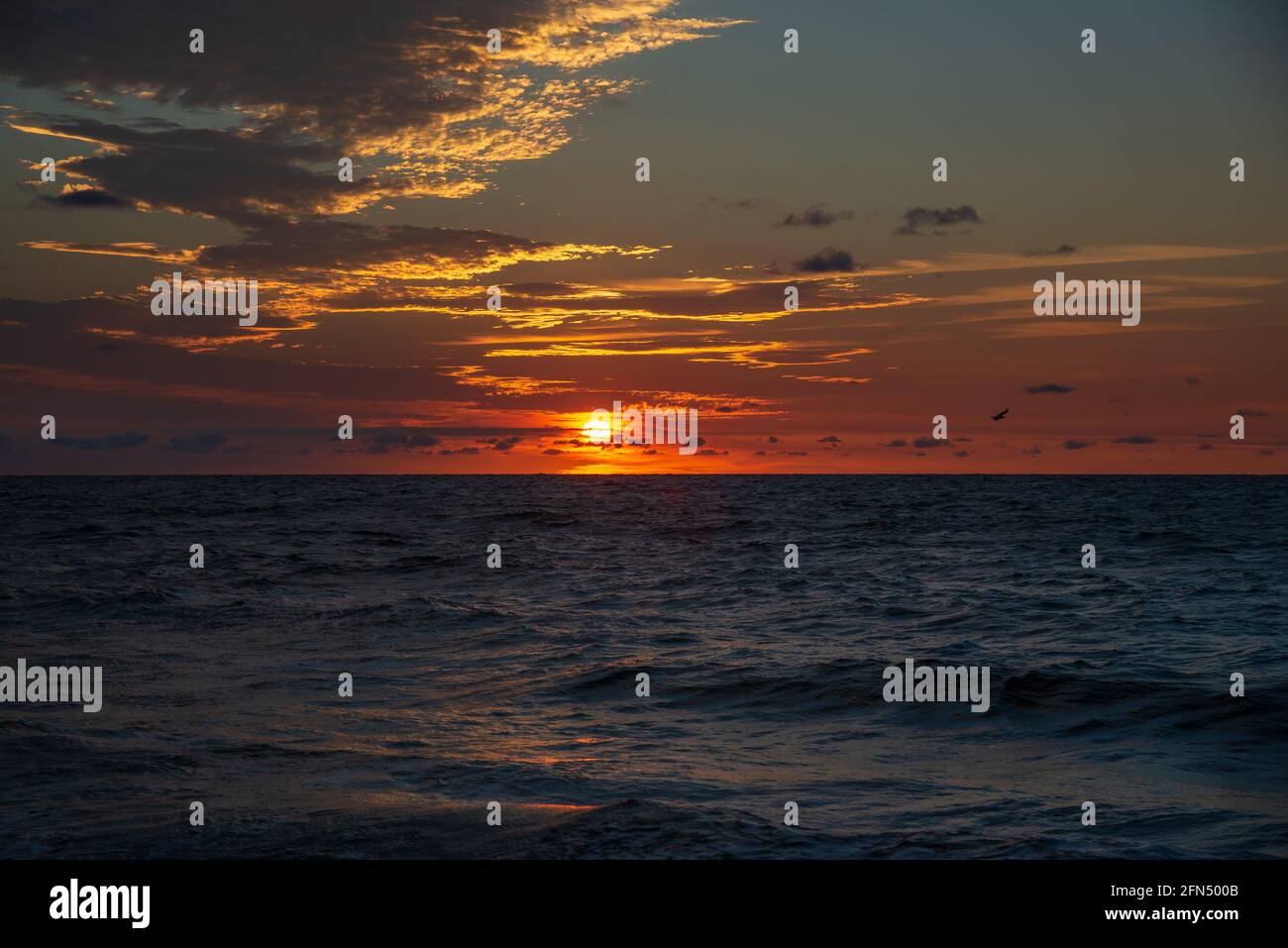 Bright sunrise sky over hi-res stock photography and images - Alamy