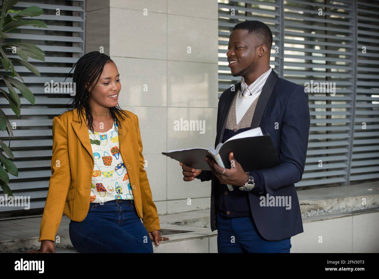 Man in formal attire presenting hi-res stock photography and images - Alamy