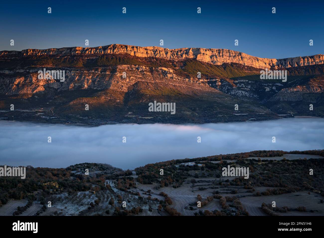 Winter sunrise with fog over Montsec range, seen from Port d'Àger ...