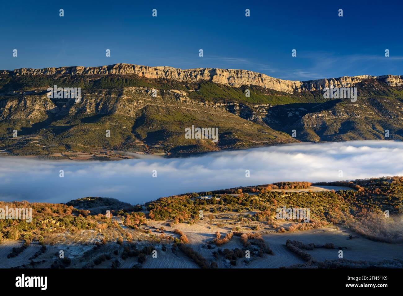 Winter sunrise with fog over Montsec range, seen from Port d'Àger ...