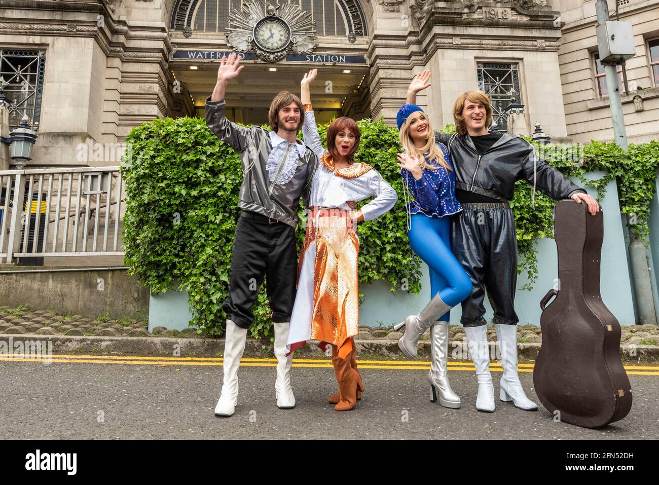 London, UK. 14 May 2021. The cast of ABBA MANIA at a photocall outside ...