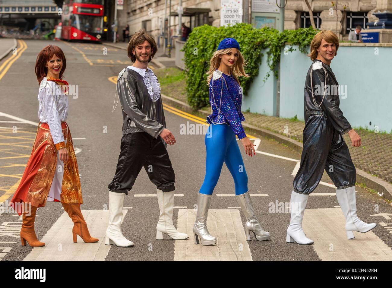 London, UK. 14 May 2021. The cast of ABBA MANIA at a photocall outside ...