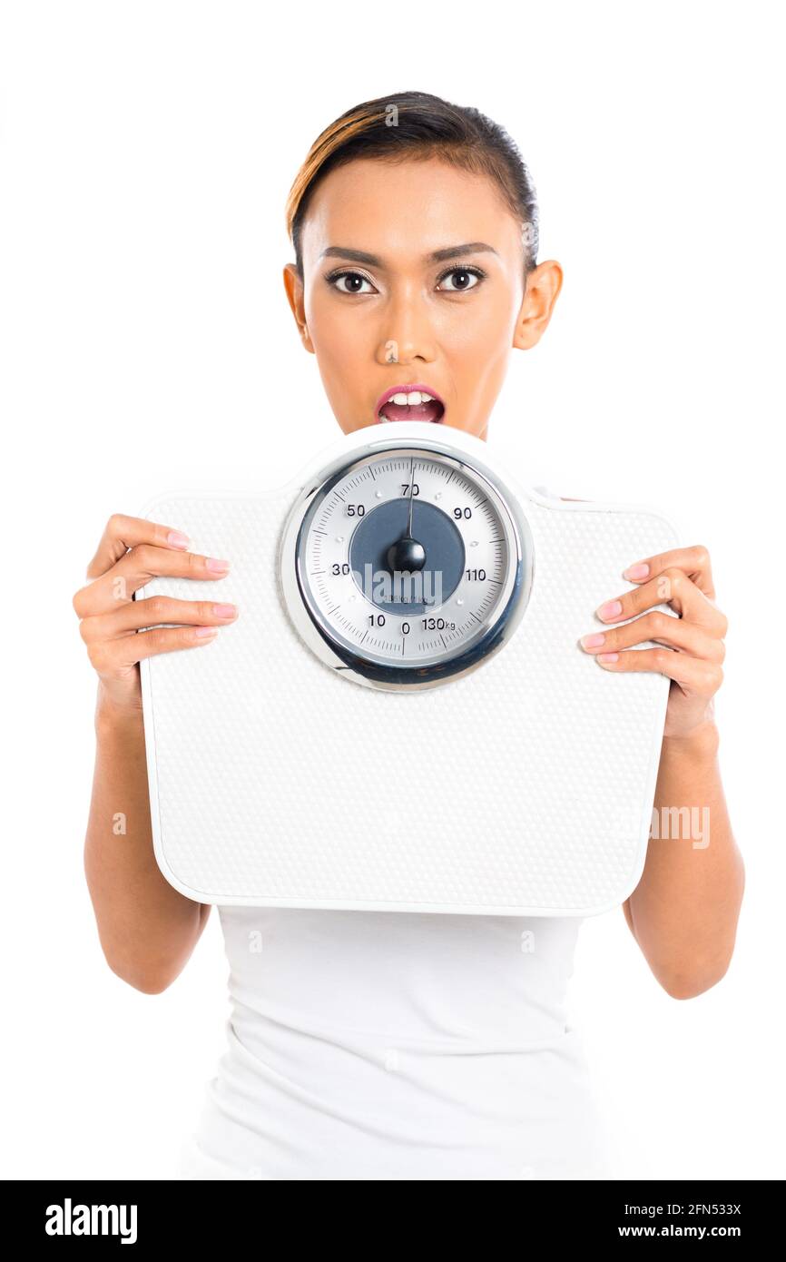 Asian woman with weight scale loosing weight Stock Photo - Alamy