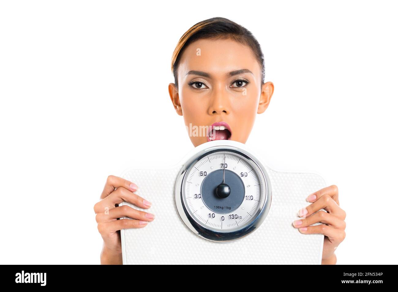 Asian woman with weight scale loosing weight Stock Photo - Alamy