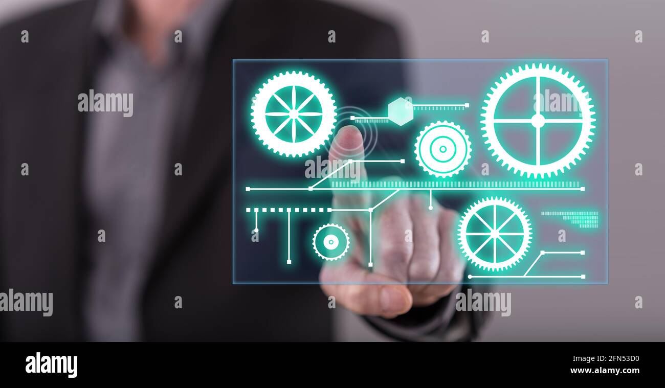 Man touching a digital technology concept on a touch screen with his ...