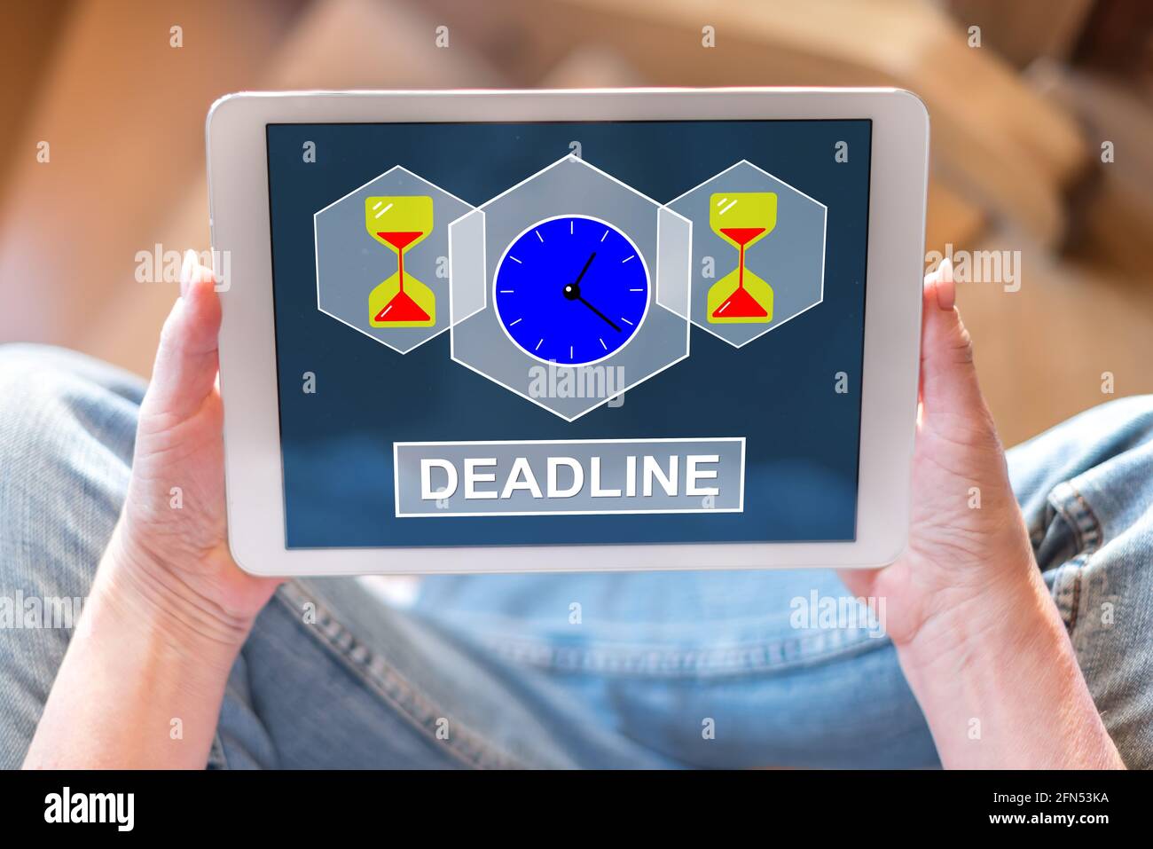 Tablet screen displaying a deadline concept Stock Photo - Alamy