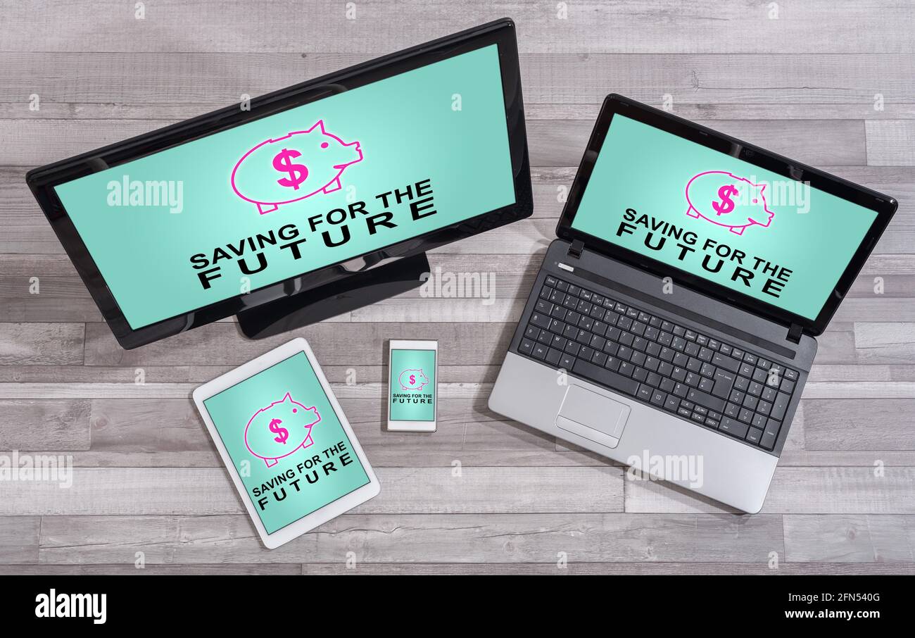 Saving for the future concept shown on different information technology ...