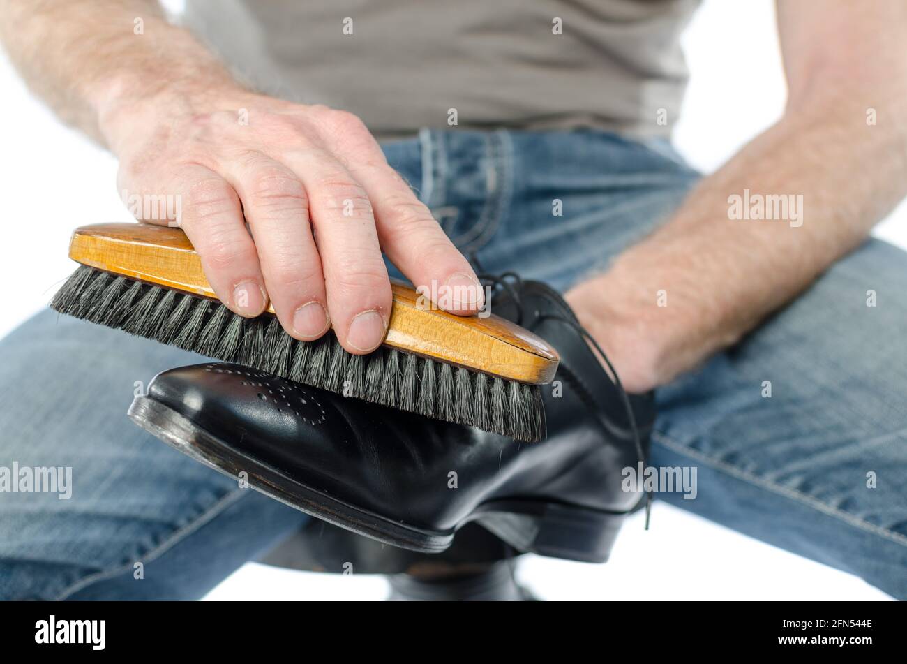 Black shoe shine worker hi-res stock photography and images - Alamy