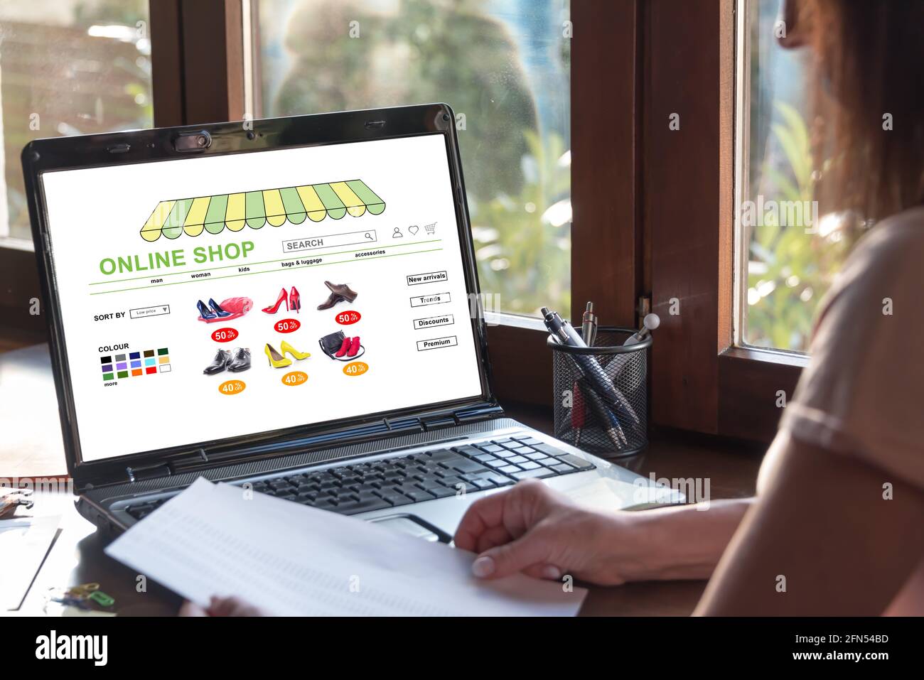 Laptop screen displaying an online shop concept Stock Photo - Alamy