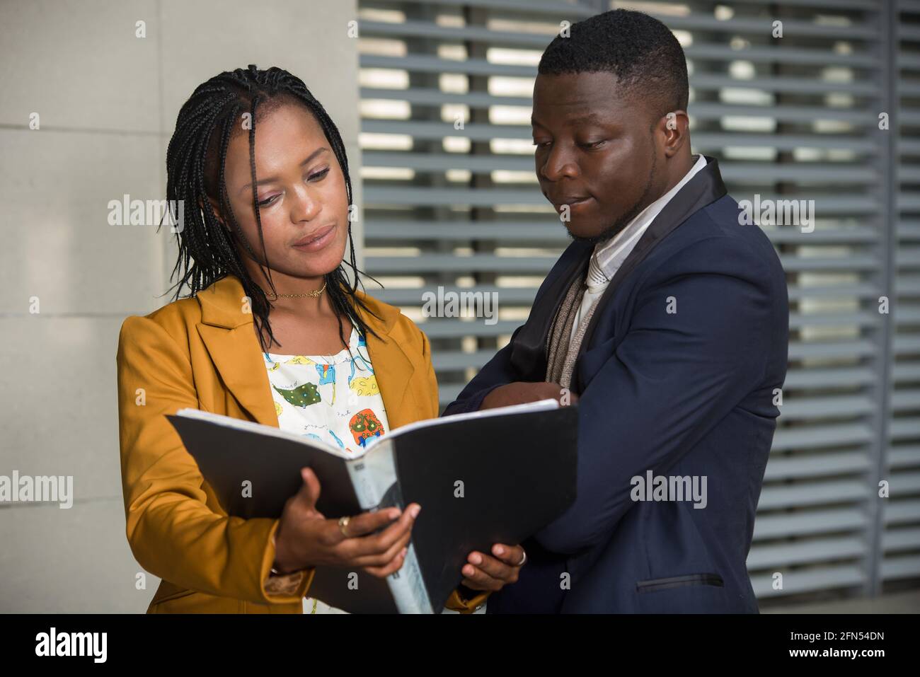 Man in formal attire presenting hi-res stock photography and images - Alamy