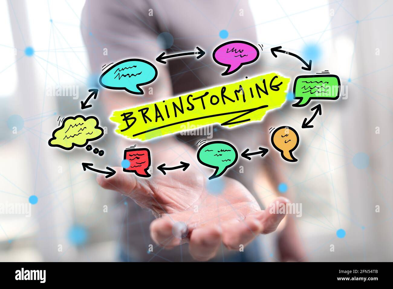 Brainstorming concept above the hand of a man in background Stock Photo ...