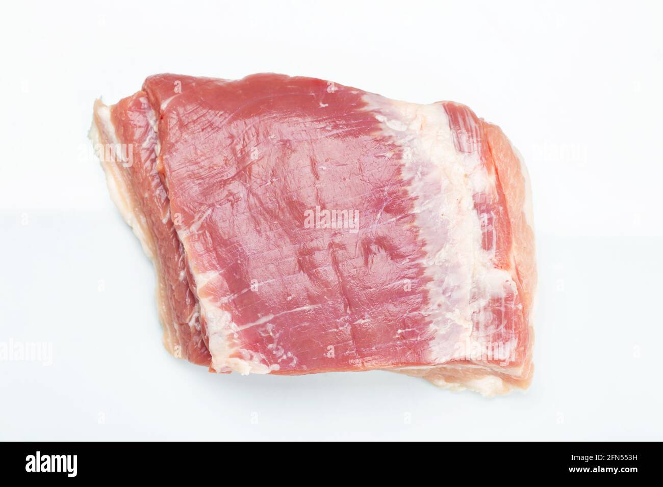 Raw pork meat isolated on white background. Top view Stock Photo - Alamy