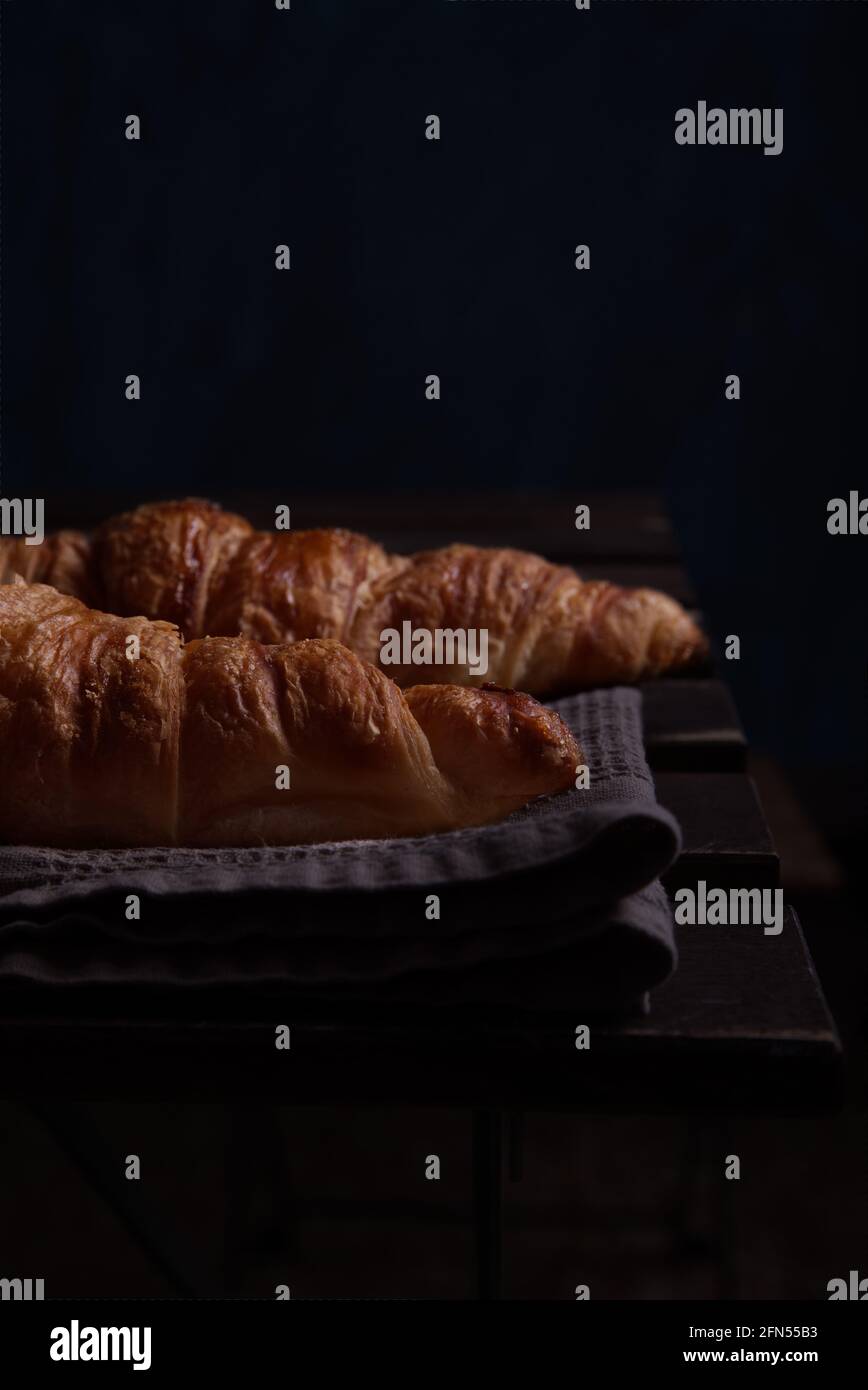Croissants on a dark background Stock Photo - Alamy