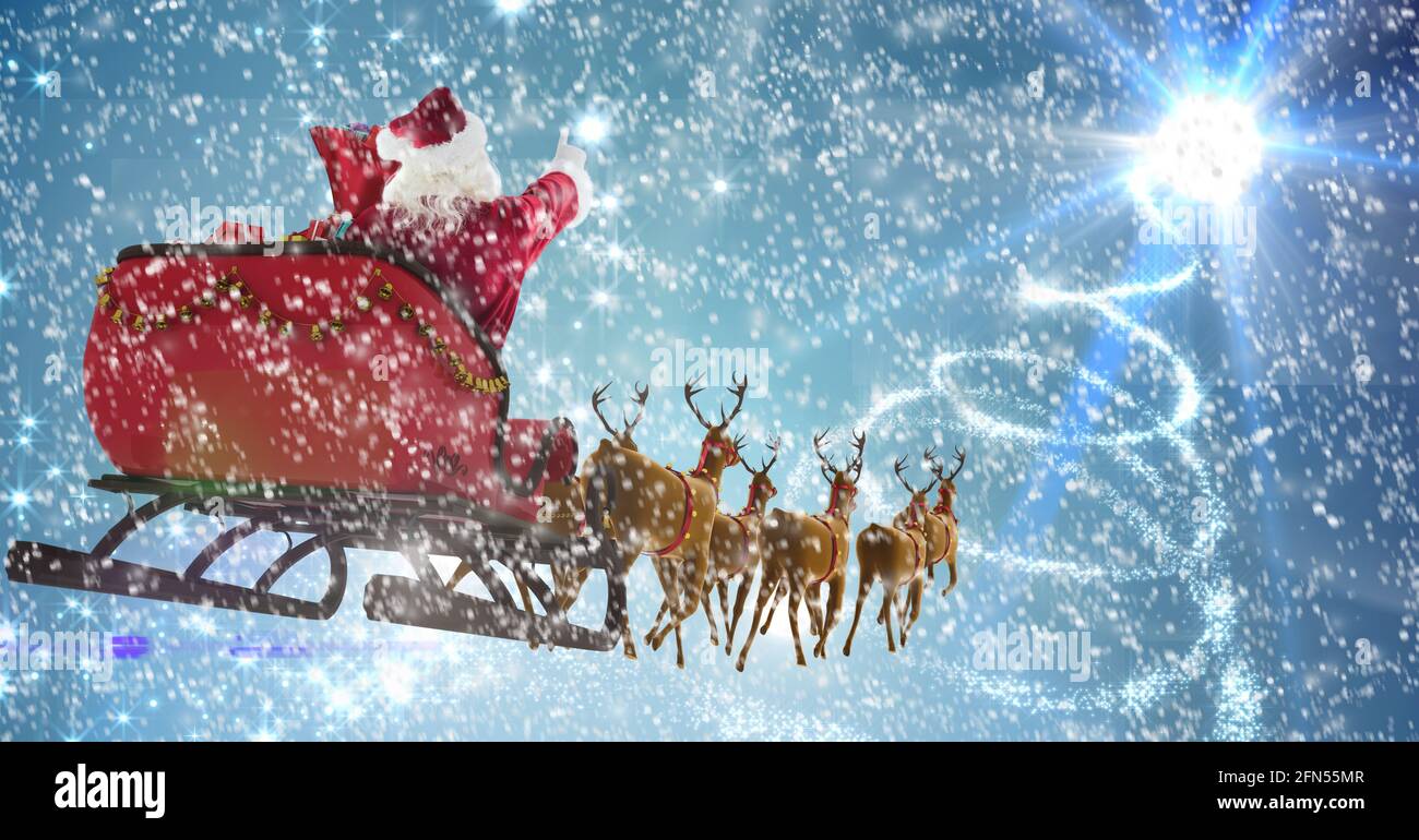 Composition of santa claus in sleigh pulled by reindeer with snow ...