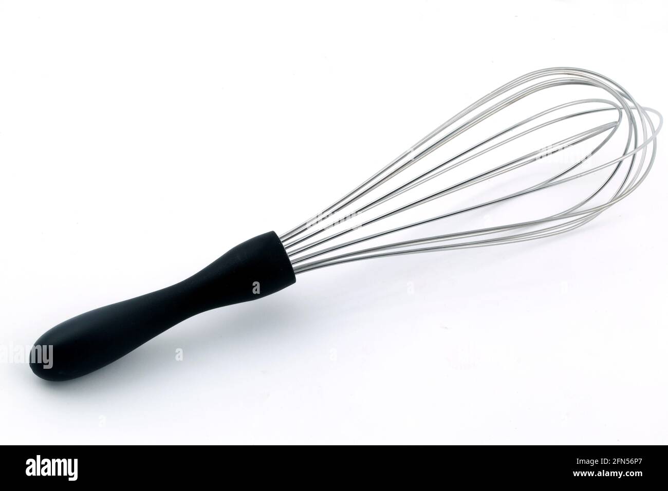 Kitchen whisk isolated on a white background Stock Photo - Alamy