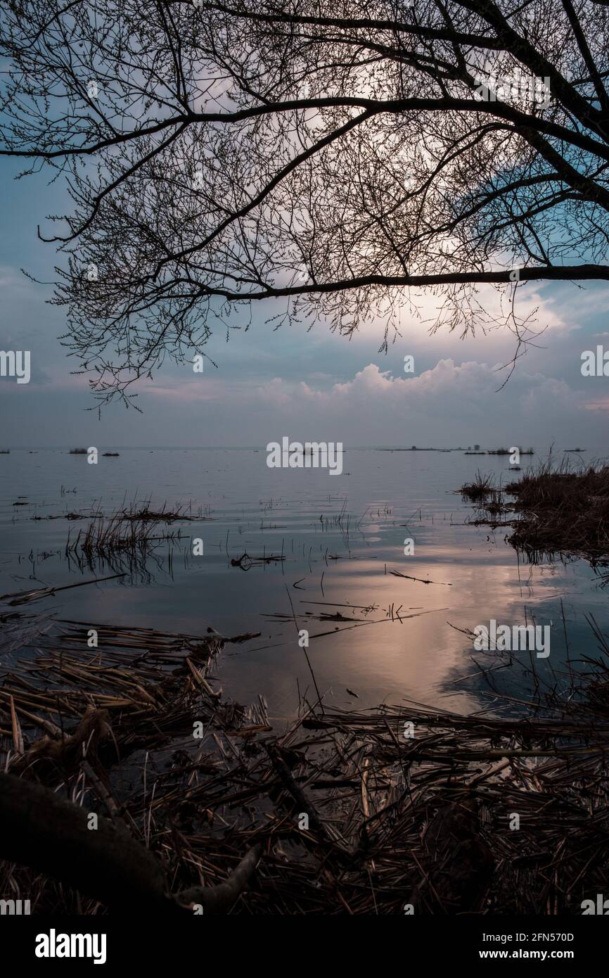 Sunset on Lake Nero during a flood Stock Photo - Alamy