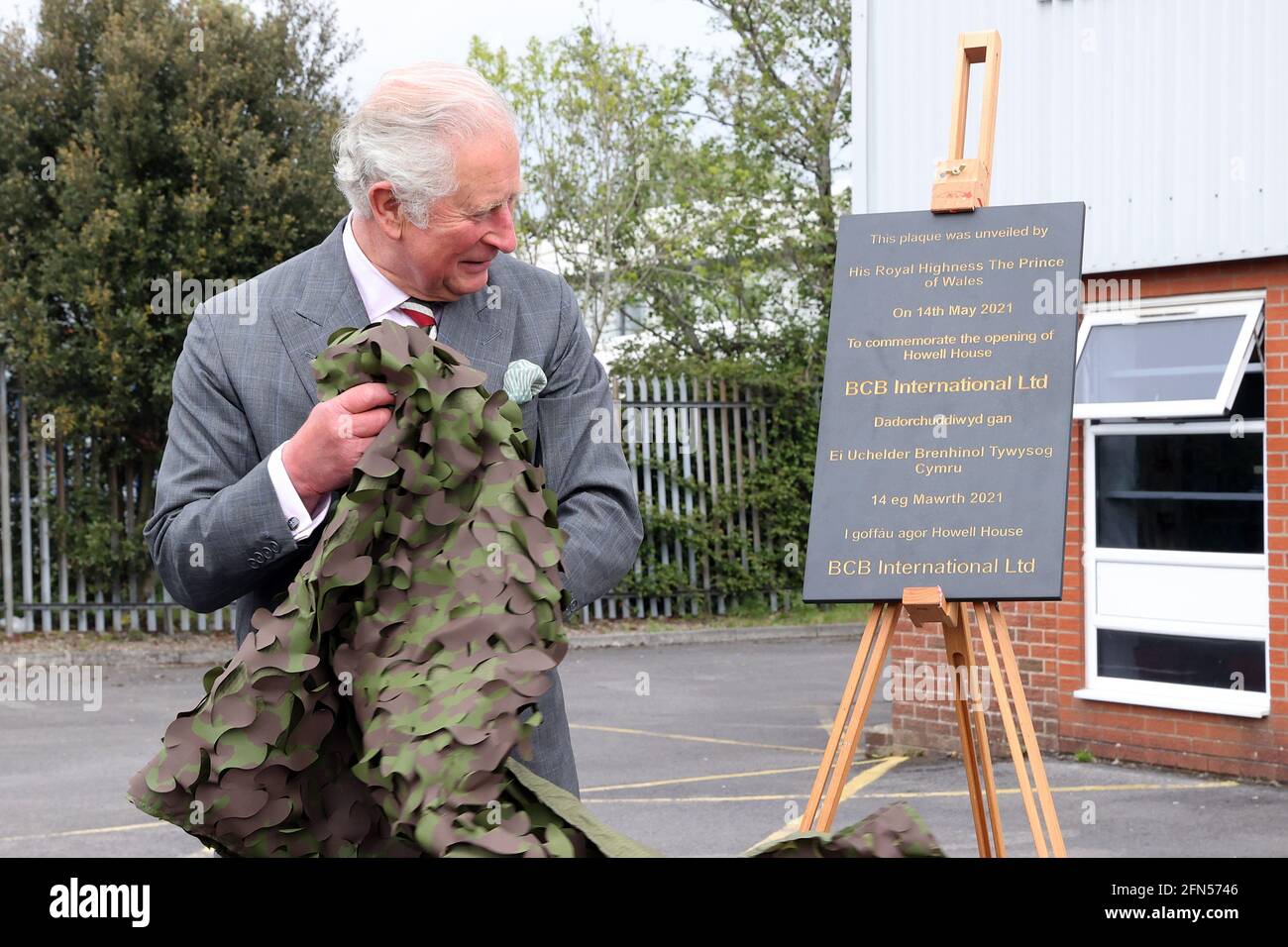 The Prince of Wales unveils a plaque to officially open the new ...