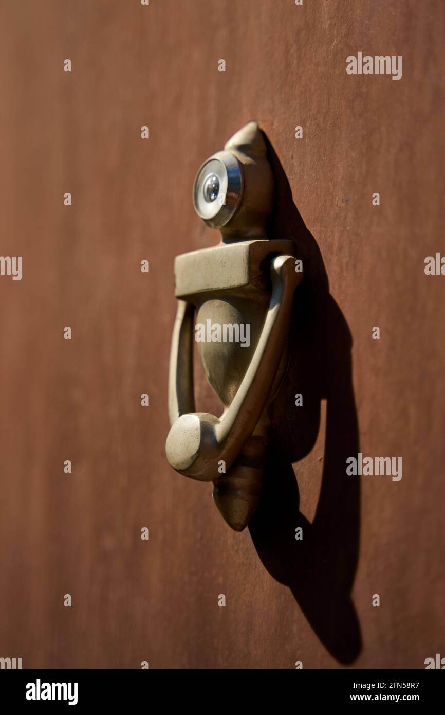 Unusual stylish door knocker in the shape of a robot Stock Photo - Alamy