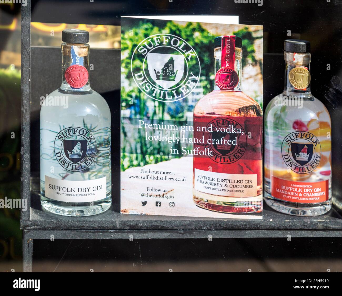 Shop window display of Suffolk Distillery gin, Aldeburgh, Suffolk ...