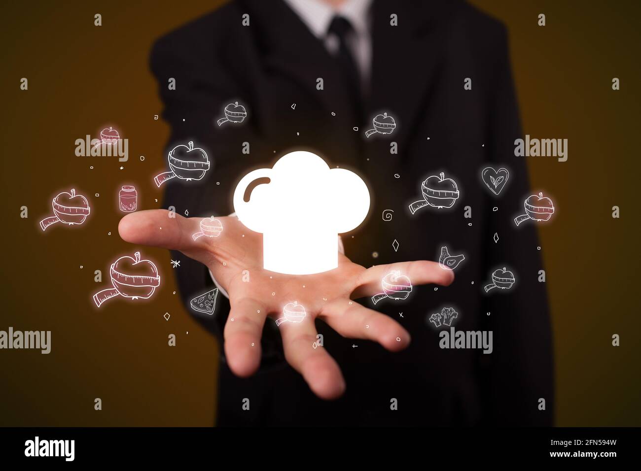 Hand holding food related icons Stock Photo - Alamy