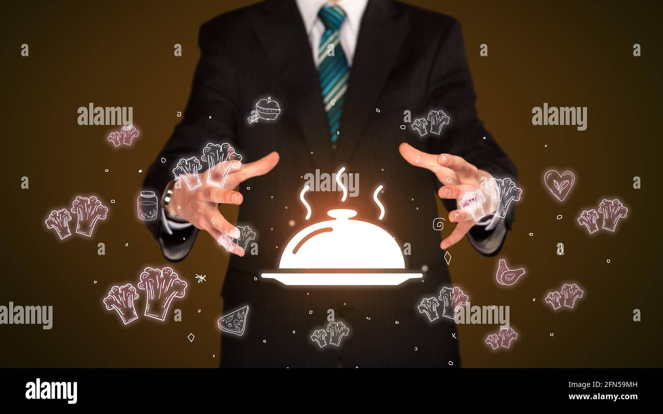 Hand holding food related icons Stock Photo - Alamy