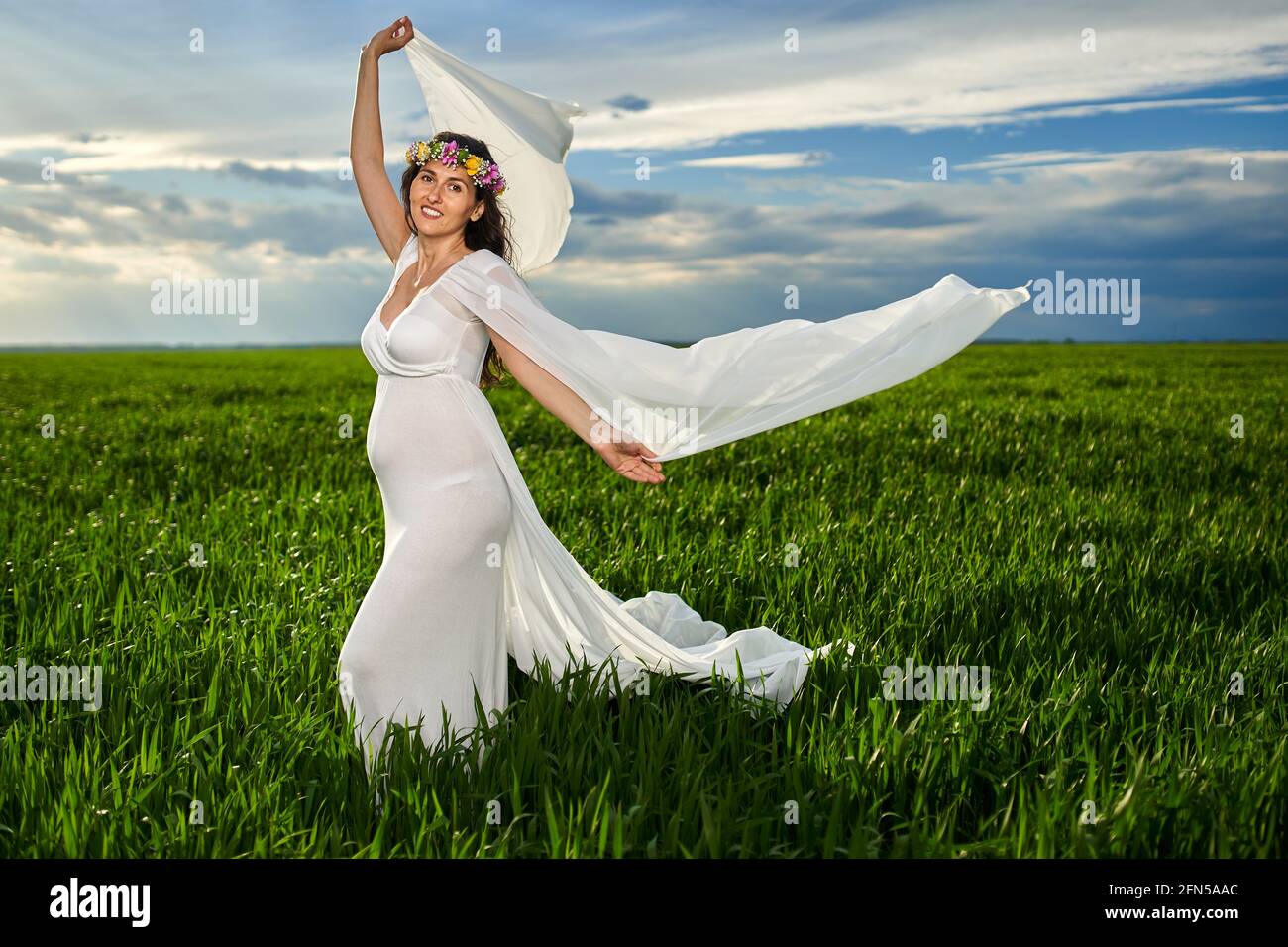 Pregnant woman flying dress hi-res stock photography and images - Alamy