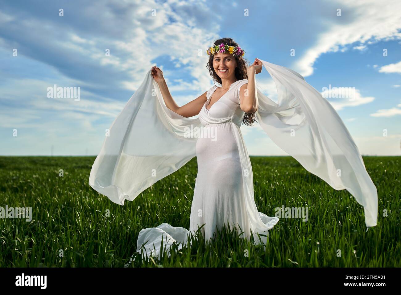 Pregnant woman flying dress hi-res stock photography and images - Alamy