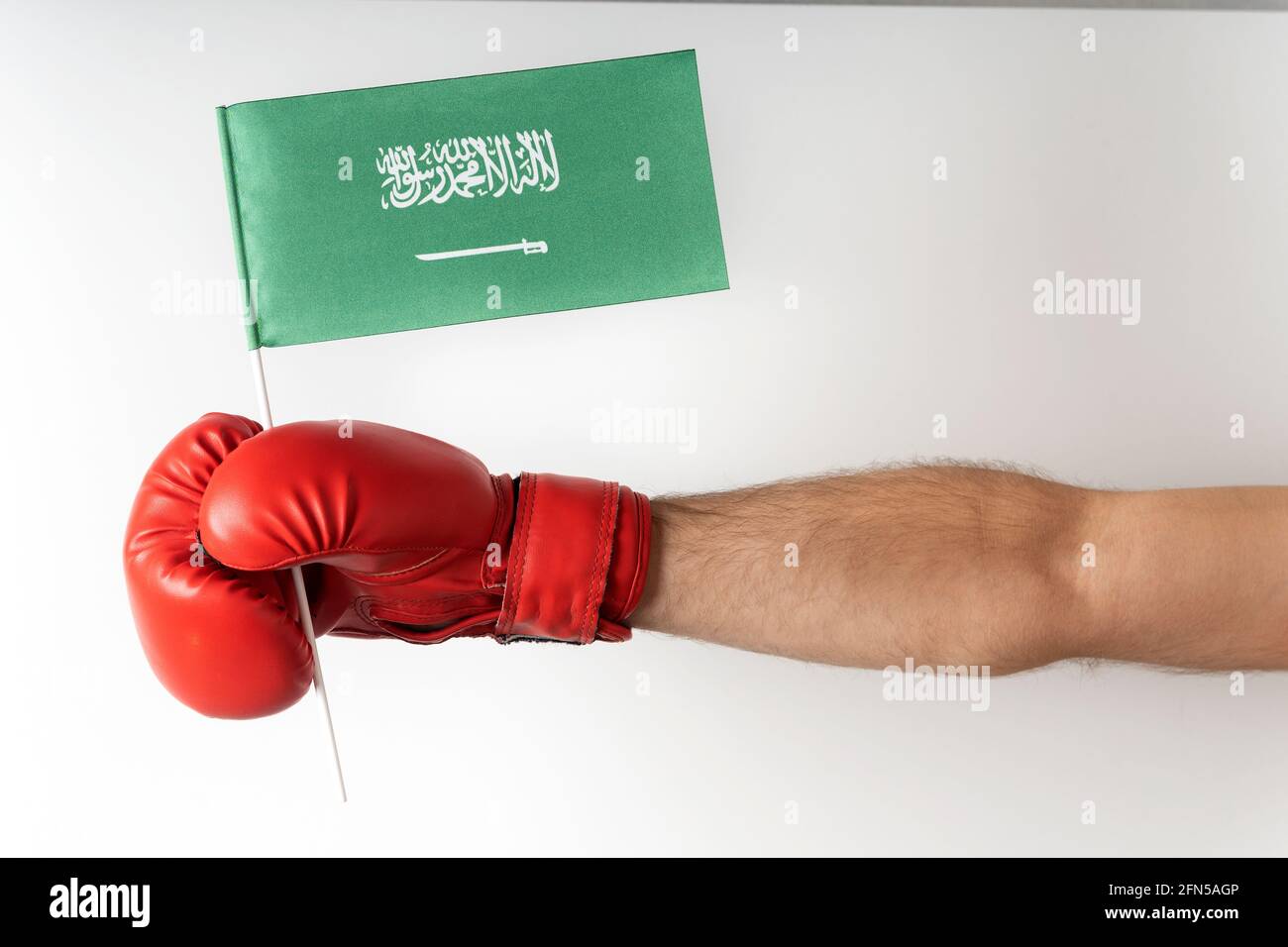 Boxing glove with Saudi Arabia flag. Boxer holds flag of Saudi Arabia ...