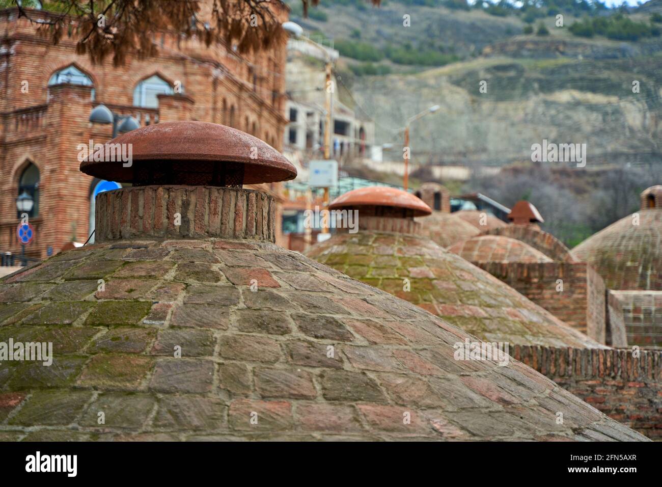 Popular city landmark in Tbilisi. Ancient underground complex of sulfur ...