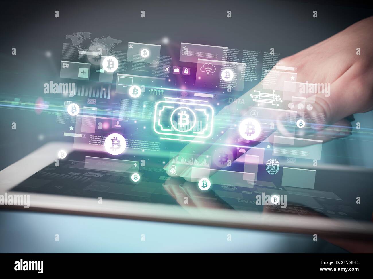 Close-up of a hand using tablet, currency concept Stock Photo - Alamy