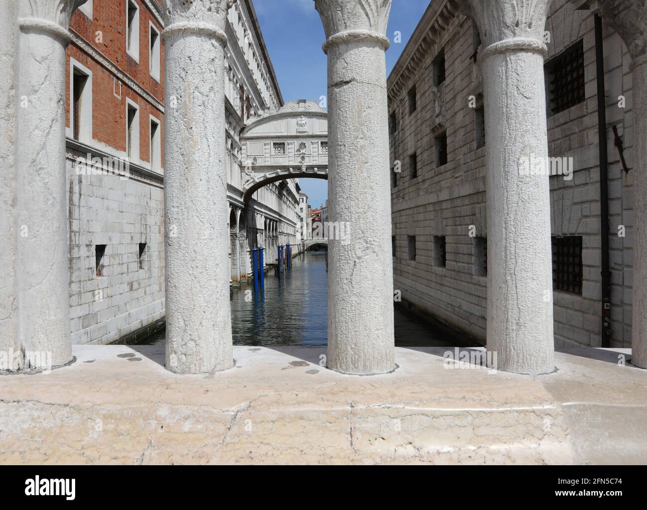 stone balustrade and in the background the famous bridge of sighs in ...