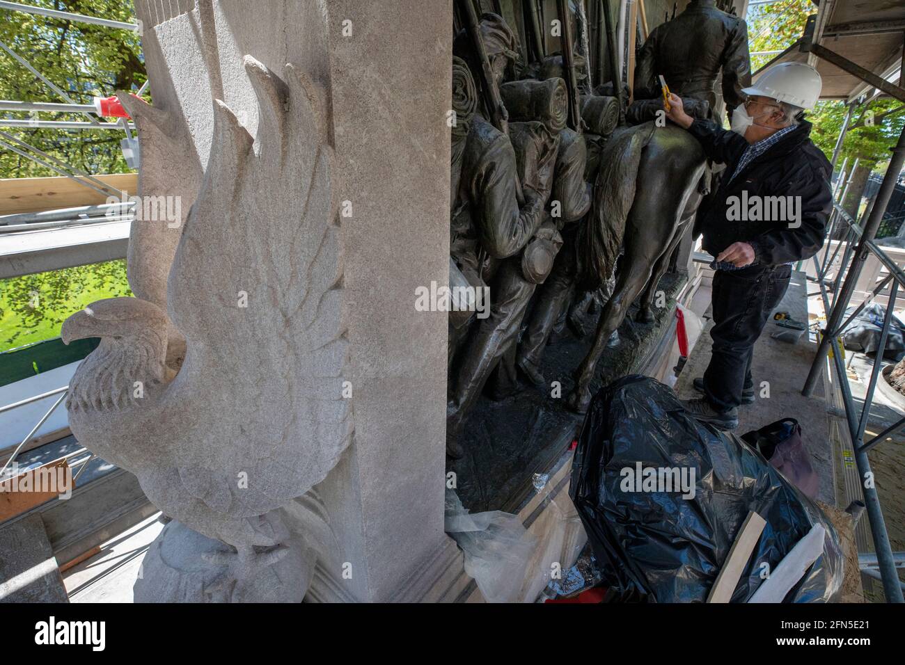 Restoration of the bronze relief sculpture of Robert Gould Shaw and the ...