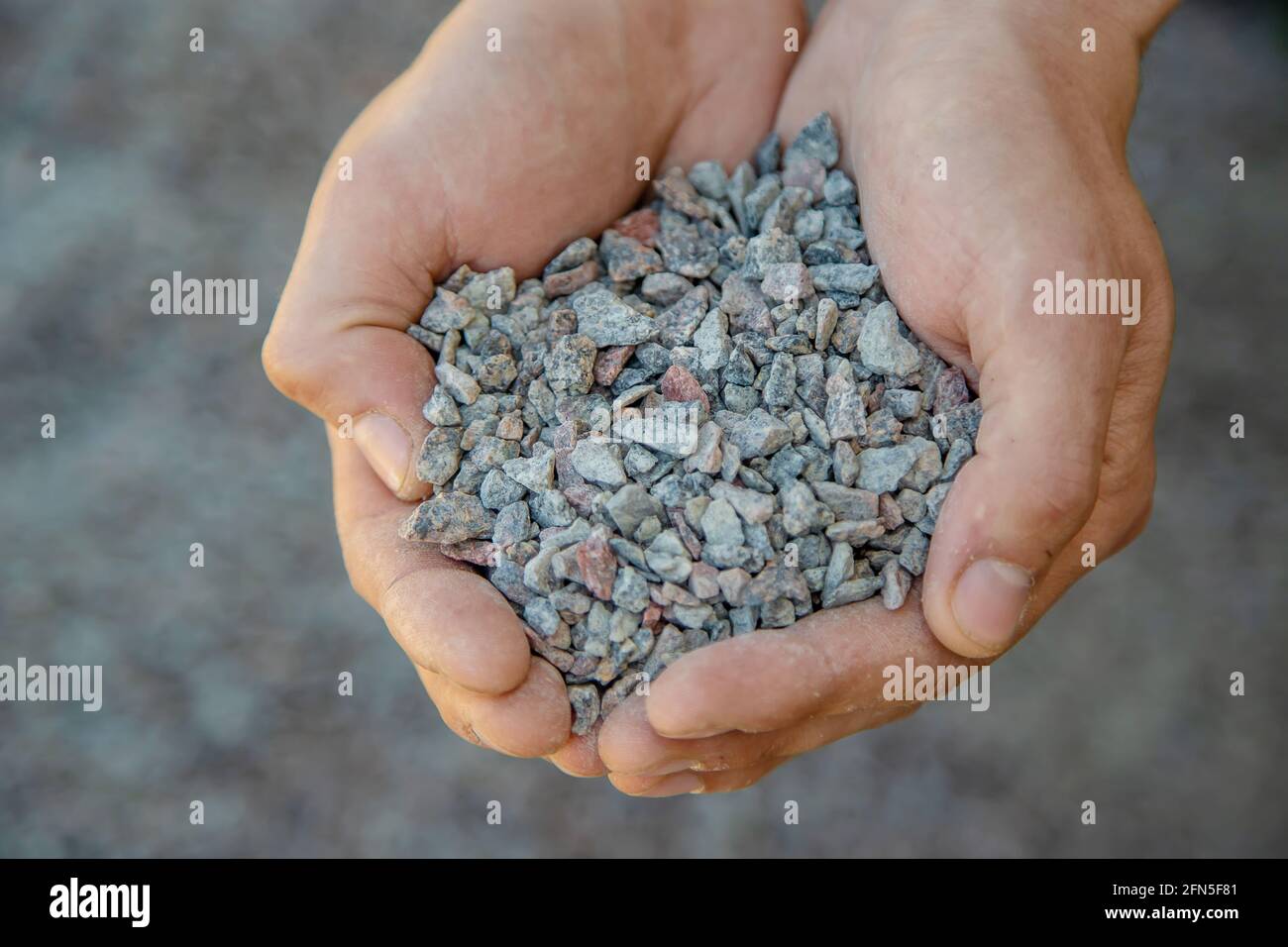 Holding hands gravel hi-res stock photography and images - Alamy