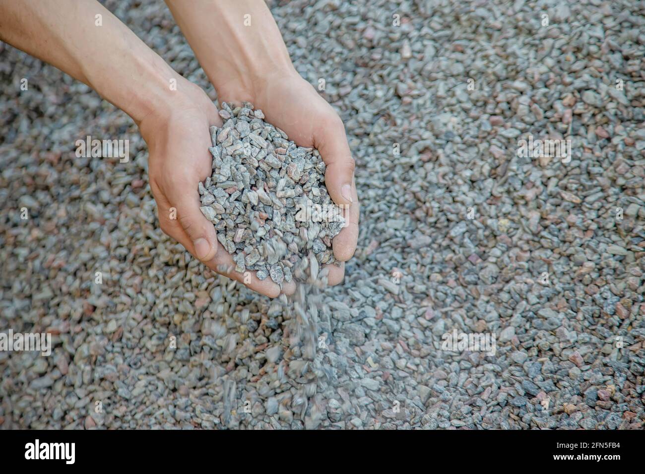Holding hands gravel hi-res stock photography and images - Alamy