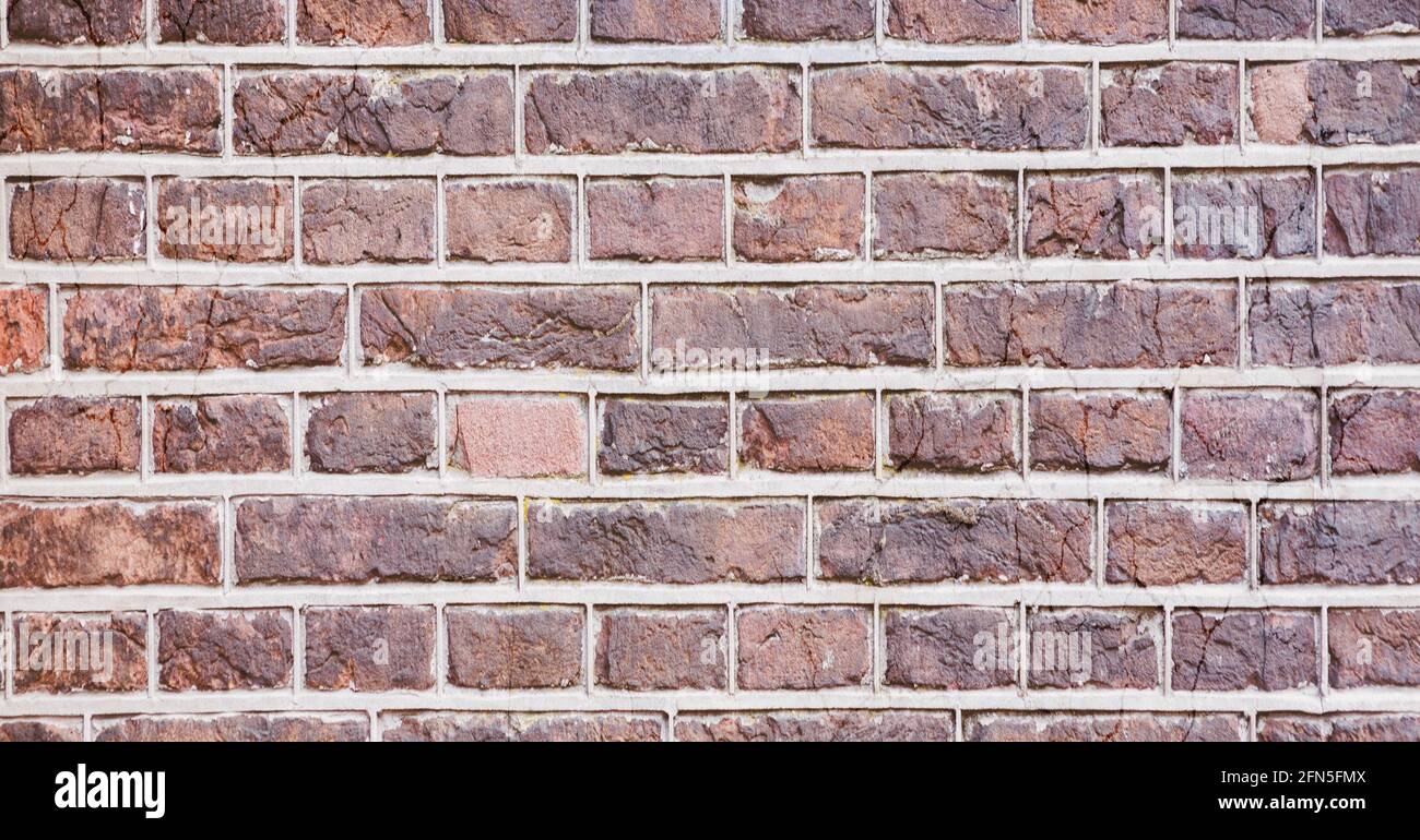 Close-up view of a mix color brick wall, backgrounds and urban concepts ...
