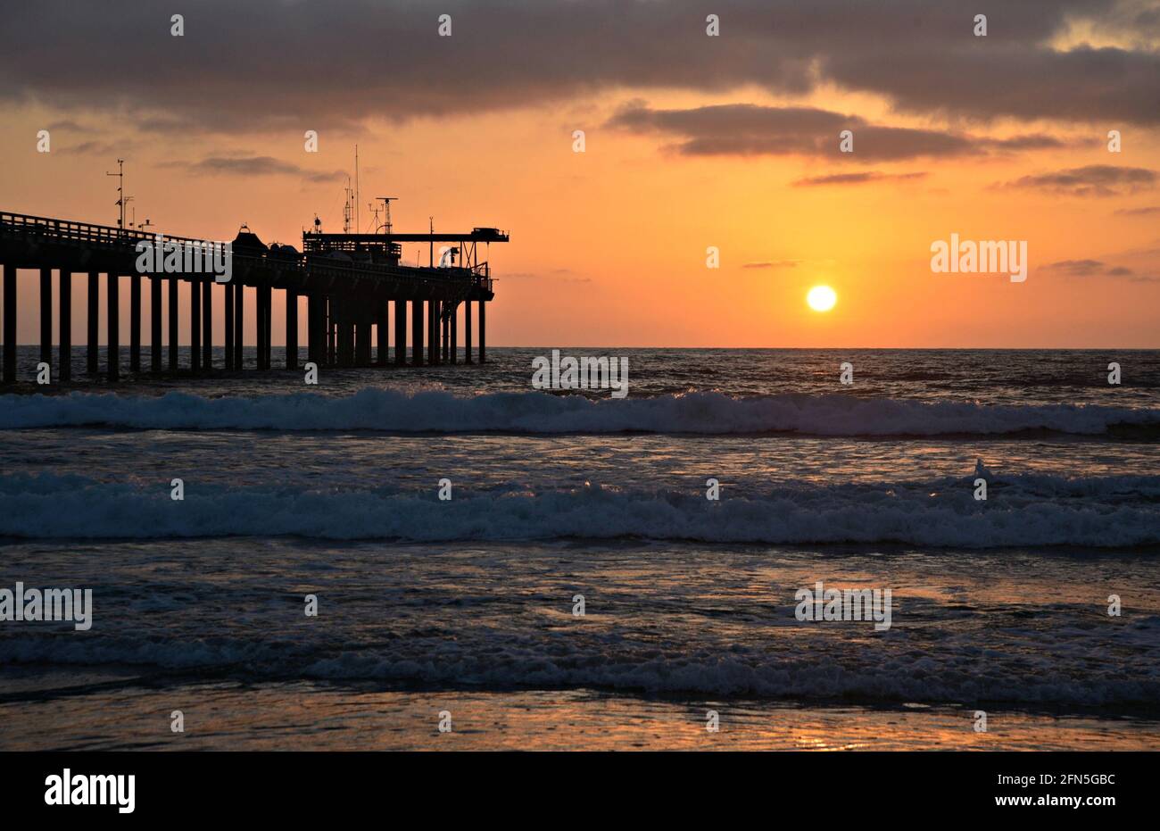Sunset seascape with scenic view of Ellen Browning Scripps Memorial ...