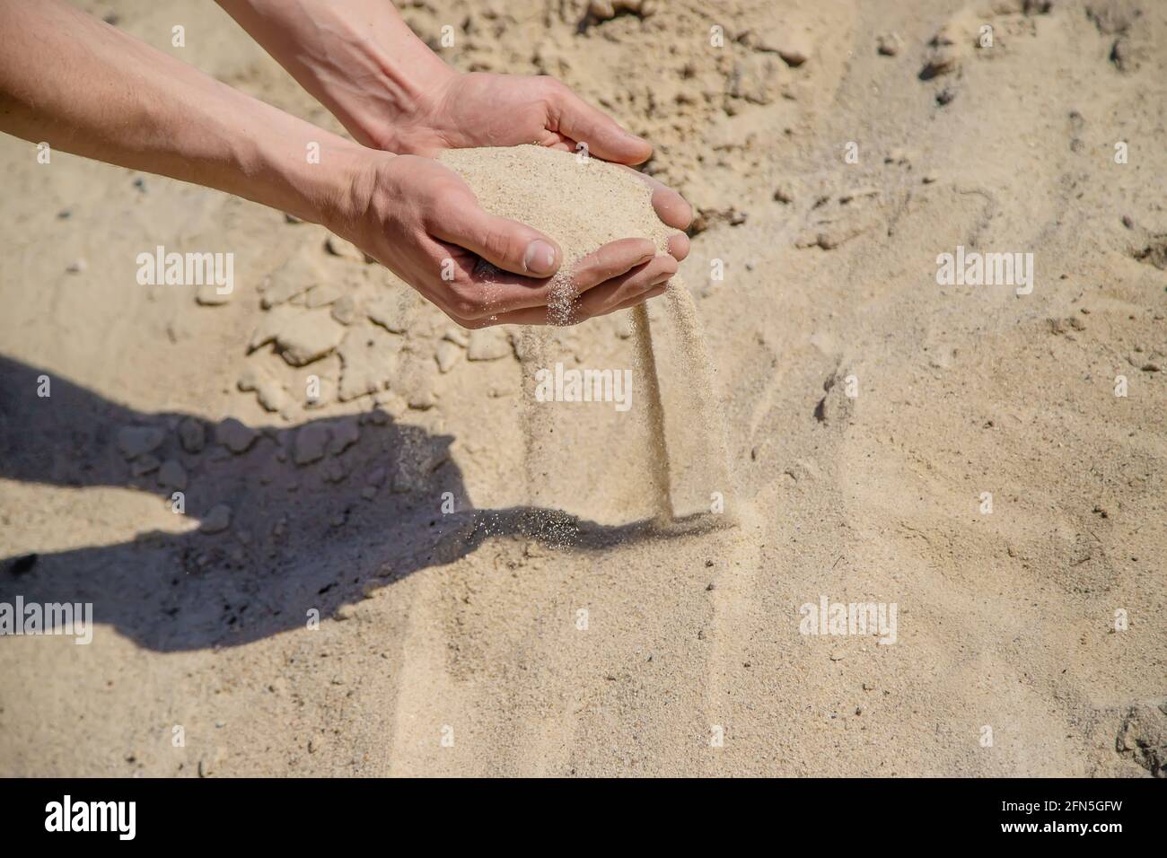 Sand in your hands hi-res stock photography and images - Alamy