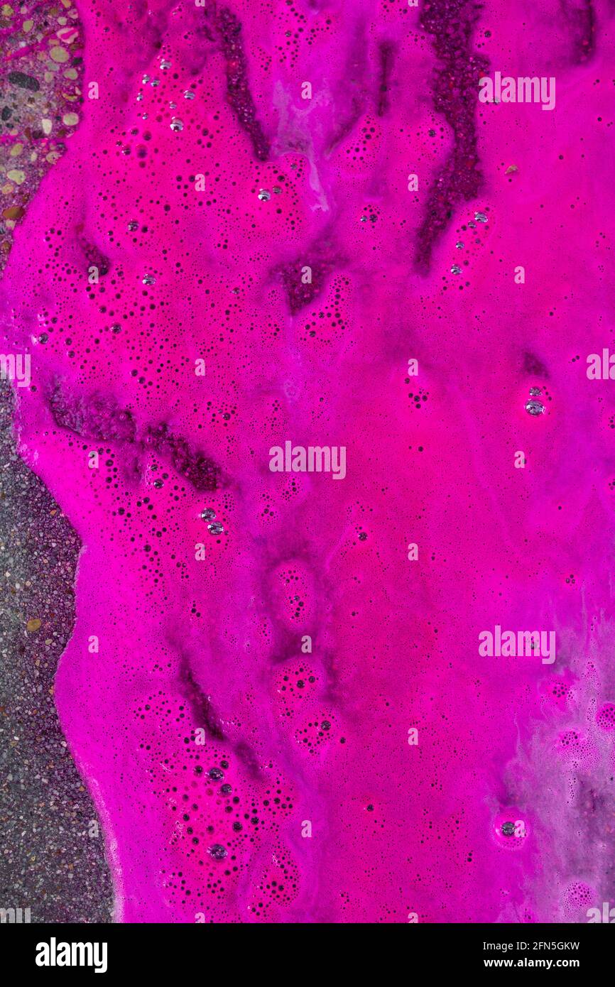 pink foam background on asphalt, abstract background Stock Photo - Alamy