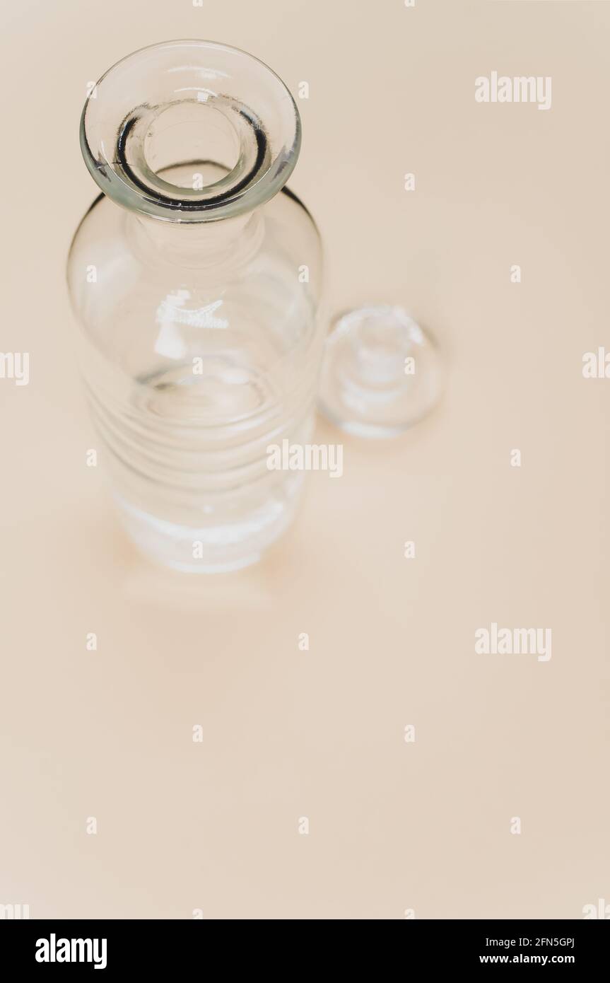 Closeup shot of a clear and clean empty glass isolated on a pink ...