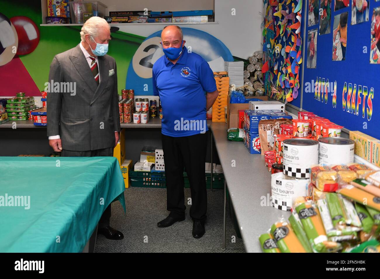 The Prince of Wales meets volunteers and staff during a visit to the ...
