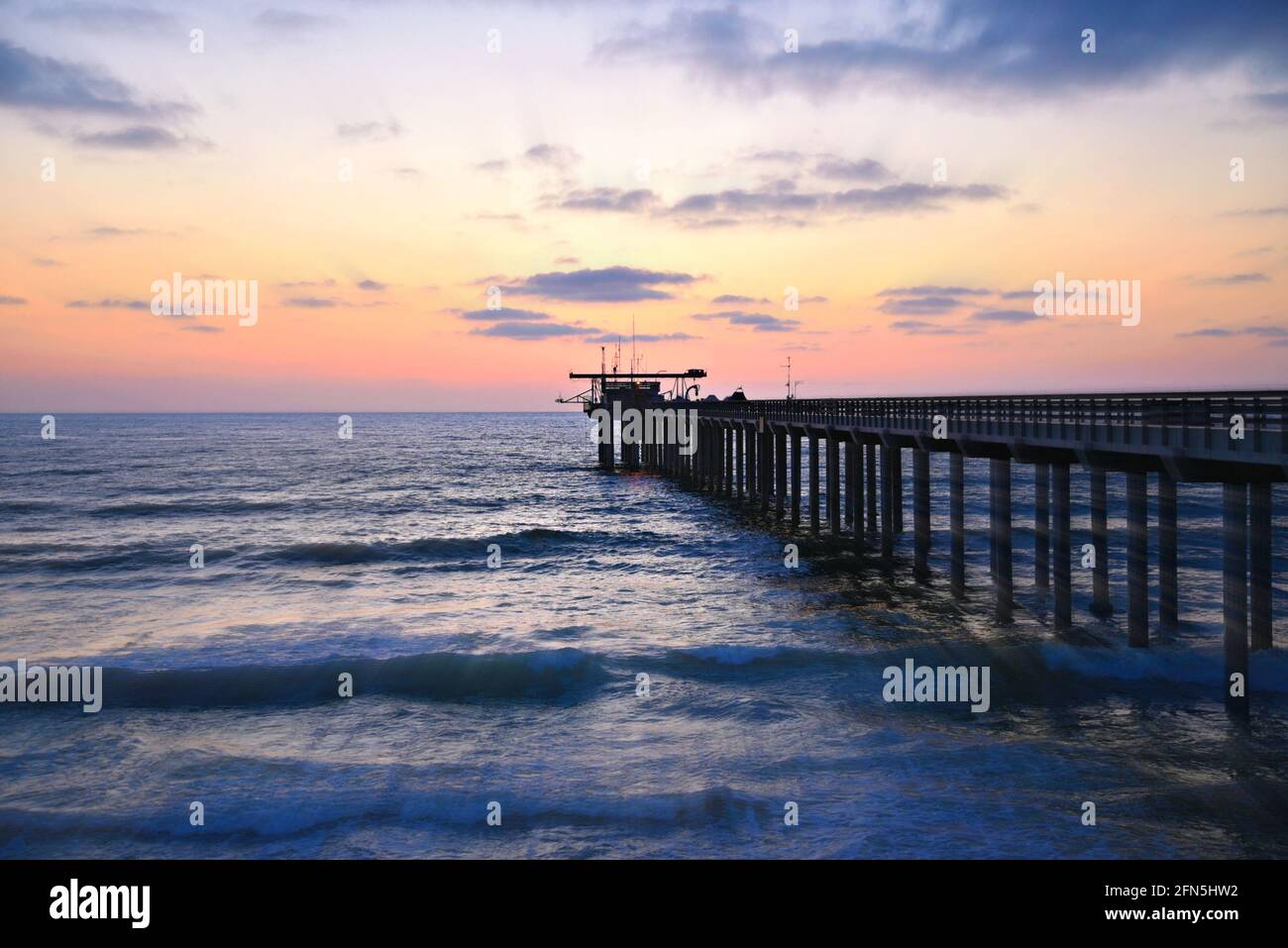 Sunset seascape with scenic view of Ellen Browning Scripps Memorial ...