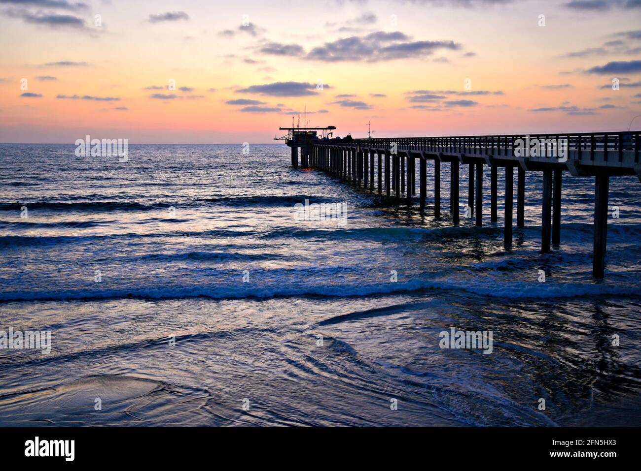 Sunset seascape with scenic view of Ellen Browning Scripps Memorial ...