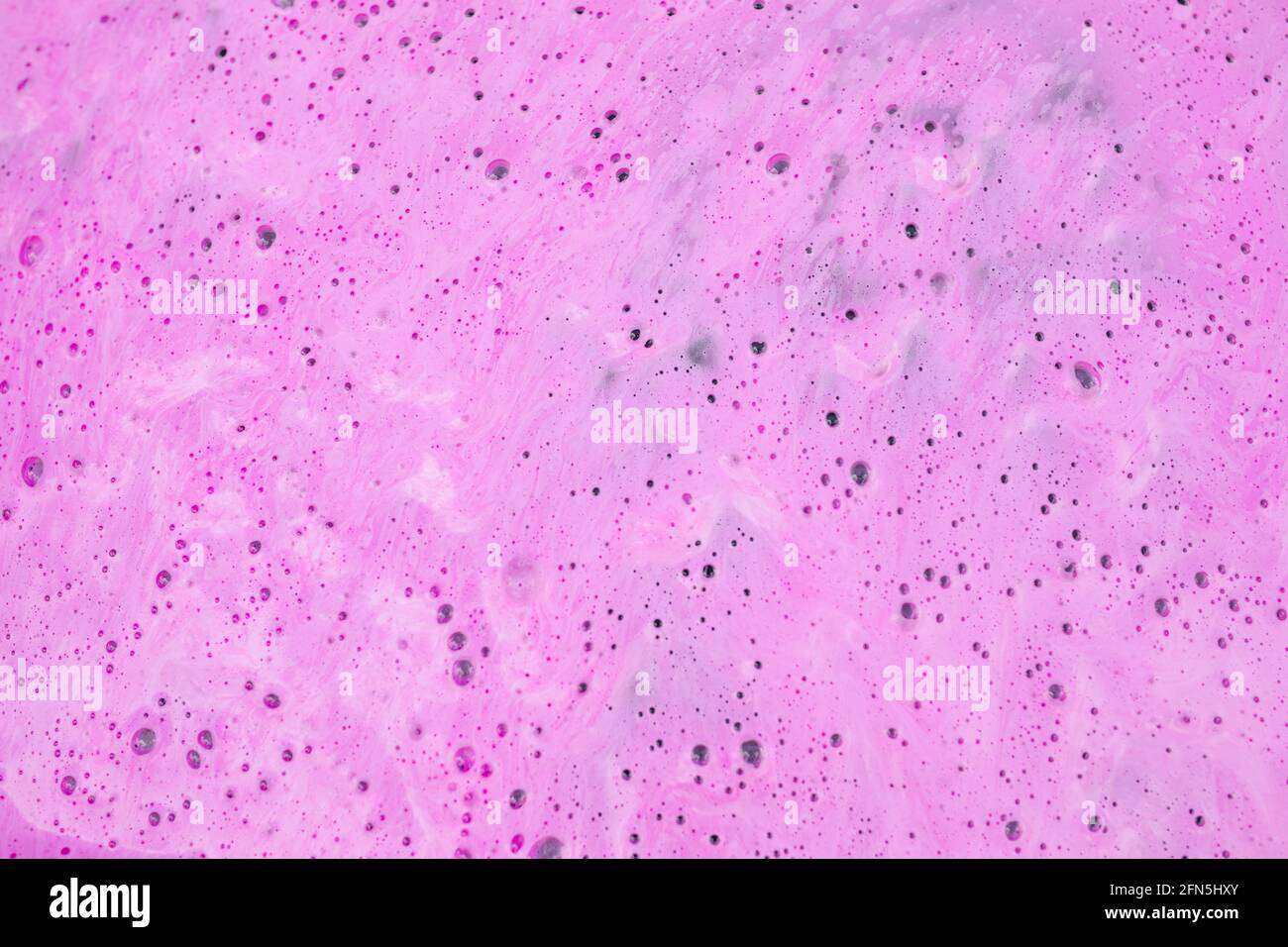 pink foam textured effect full frame background on asphalt, abstract ...