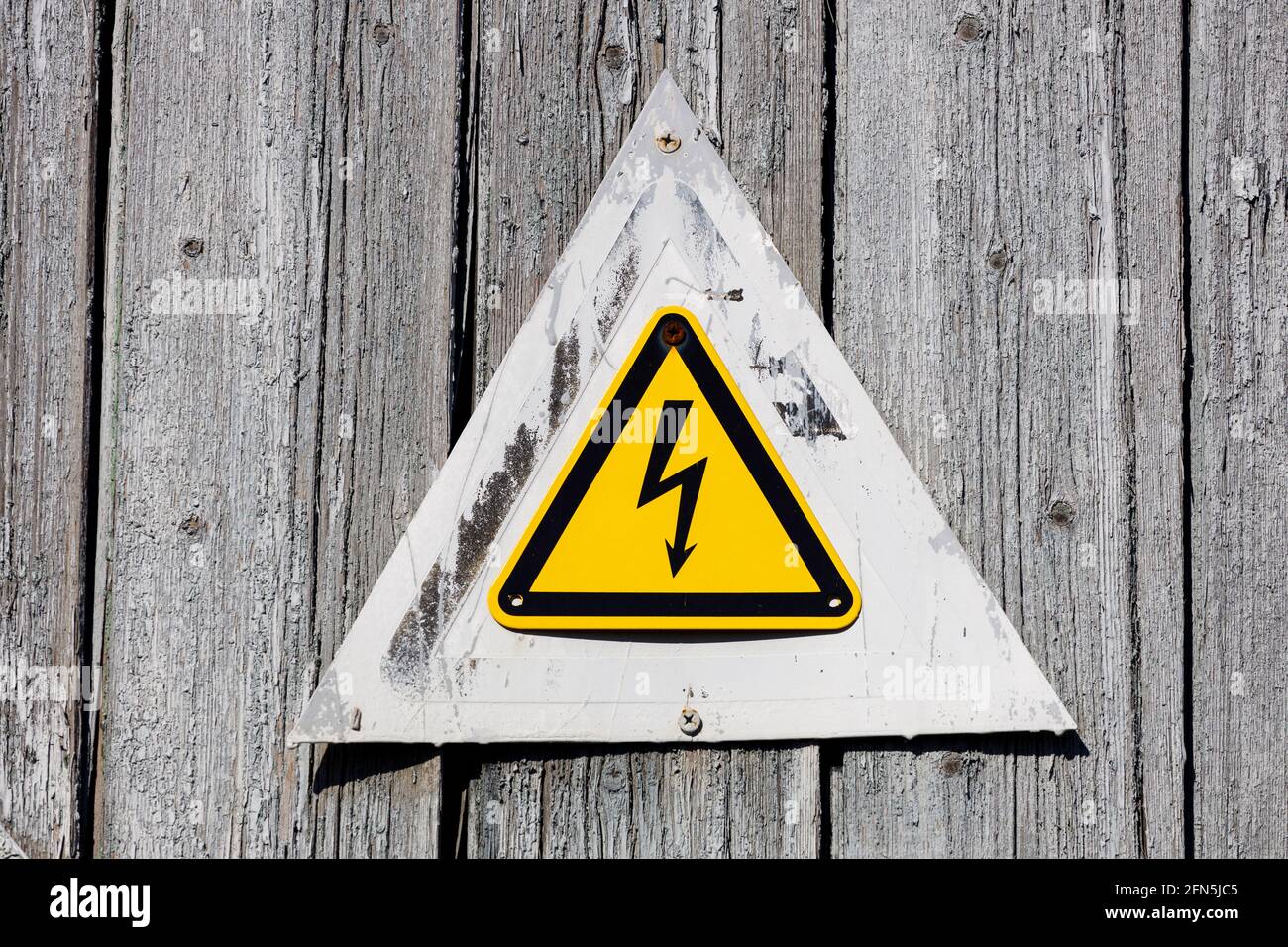 yellow triangle with lightning. warning sign about the danger of ...