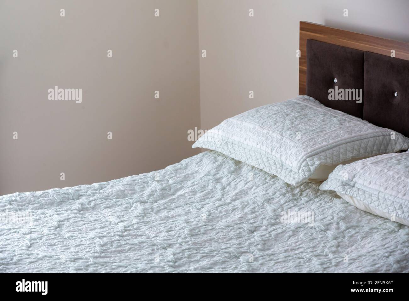 bed and pillow background. front view Stock Photo - Alamy