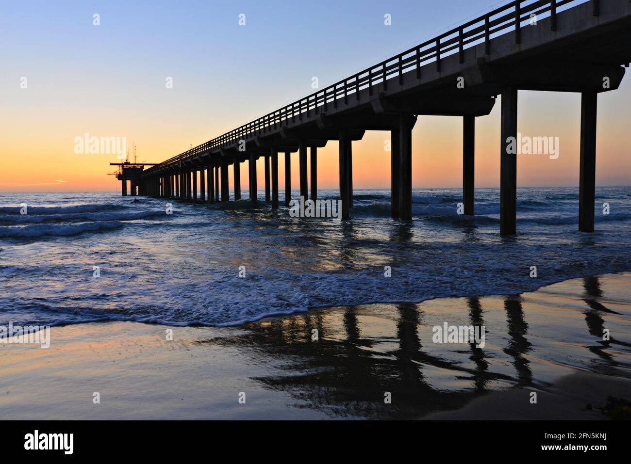 Sunset seascape with scenic view of Ellen Browning Scripps Memorial ...